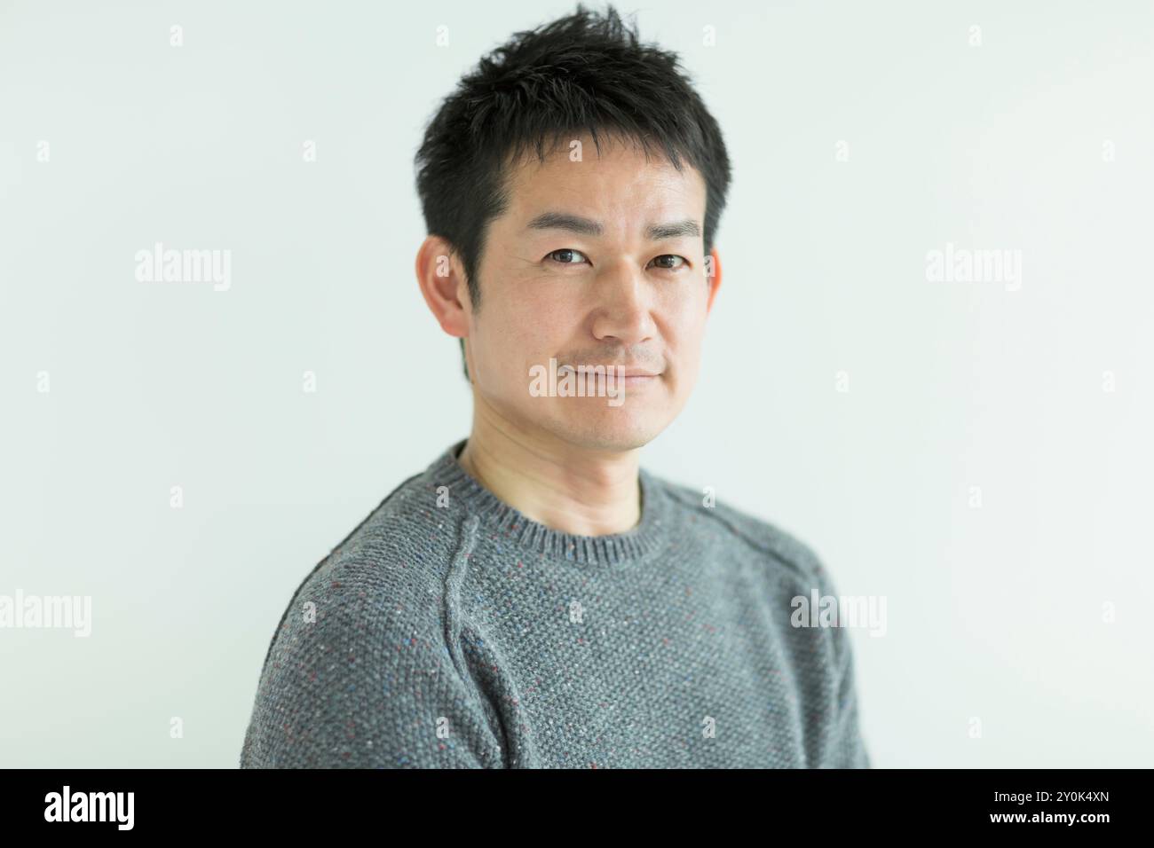 Smiling Japanese man Stock Photo - Alamy