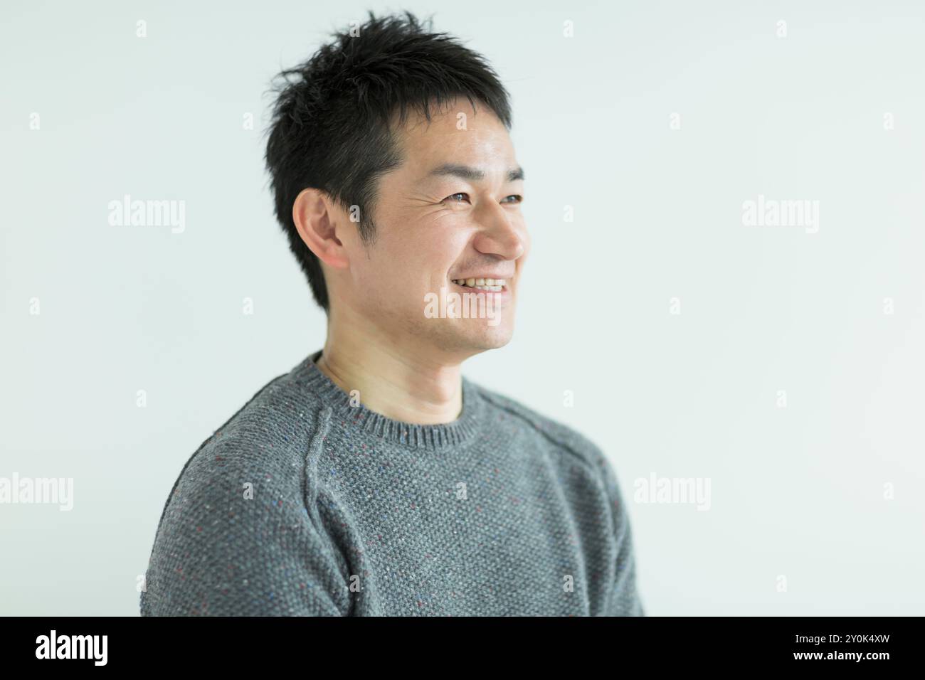 Smiling Japanese man Stock Photo - Alamy