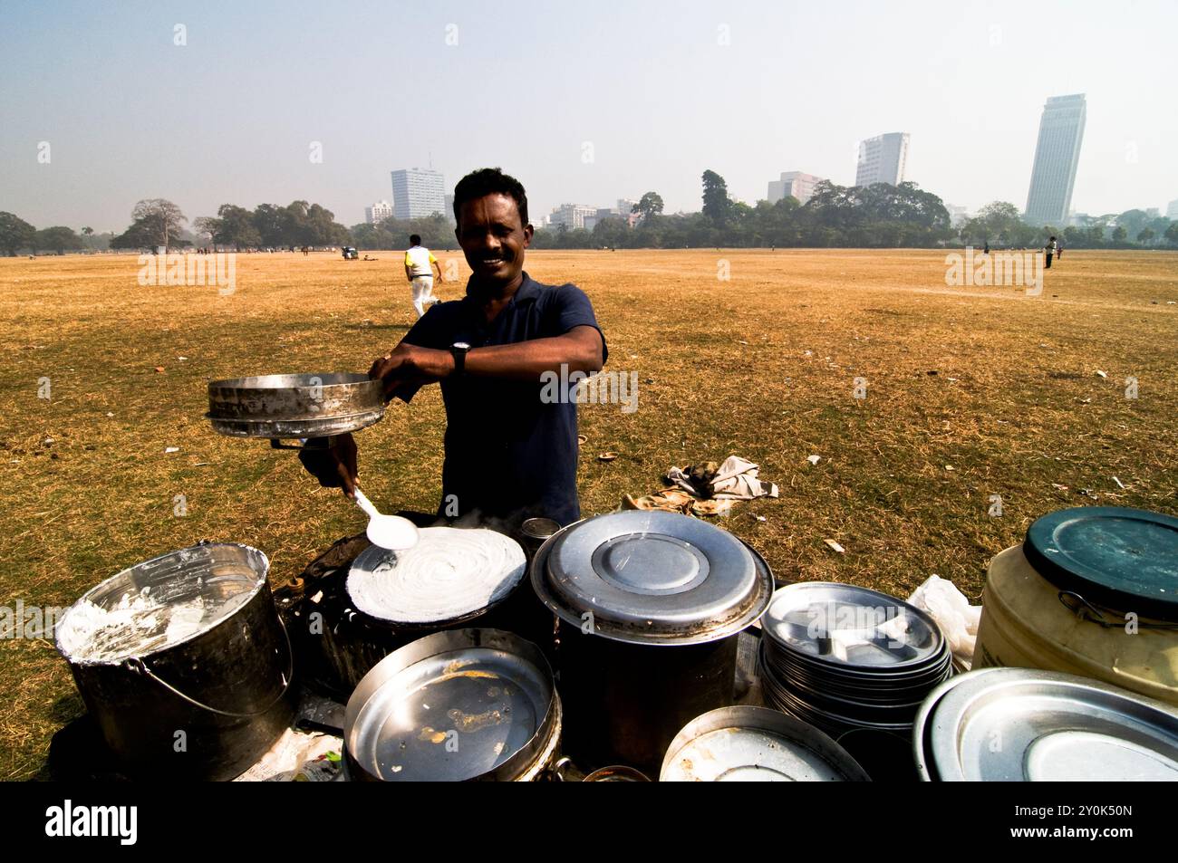 South Indian Masala Dosa being cooked in the Maidan park in Kolkata ...
