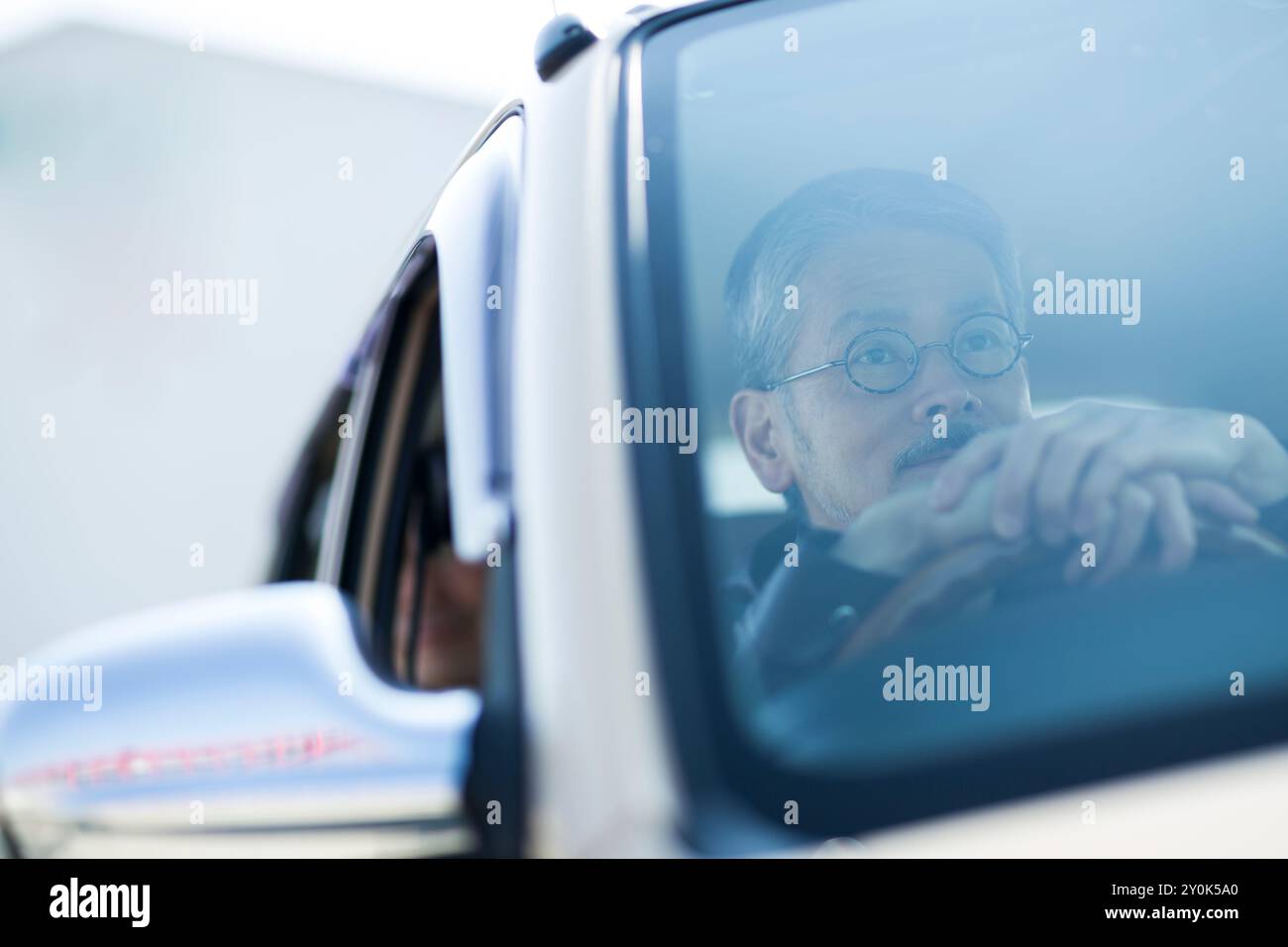 Person holding steering wheel hi-res stock photography and images - Alamy