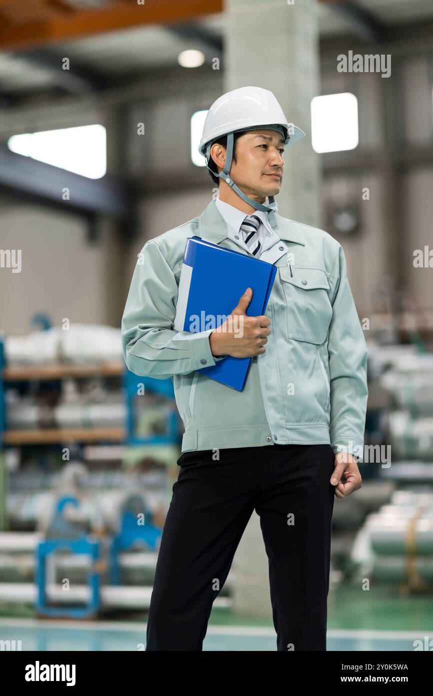 Men dressed in work clothes Stock Photo - Alamy