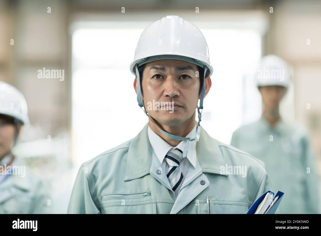 Men dressed in work clothes Stock Photo - Alamy