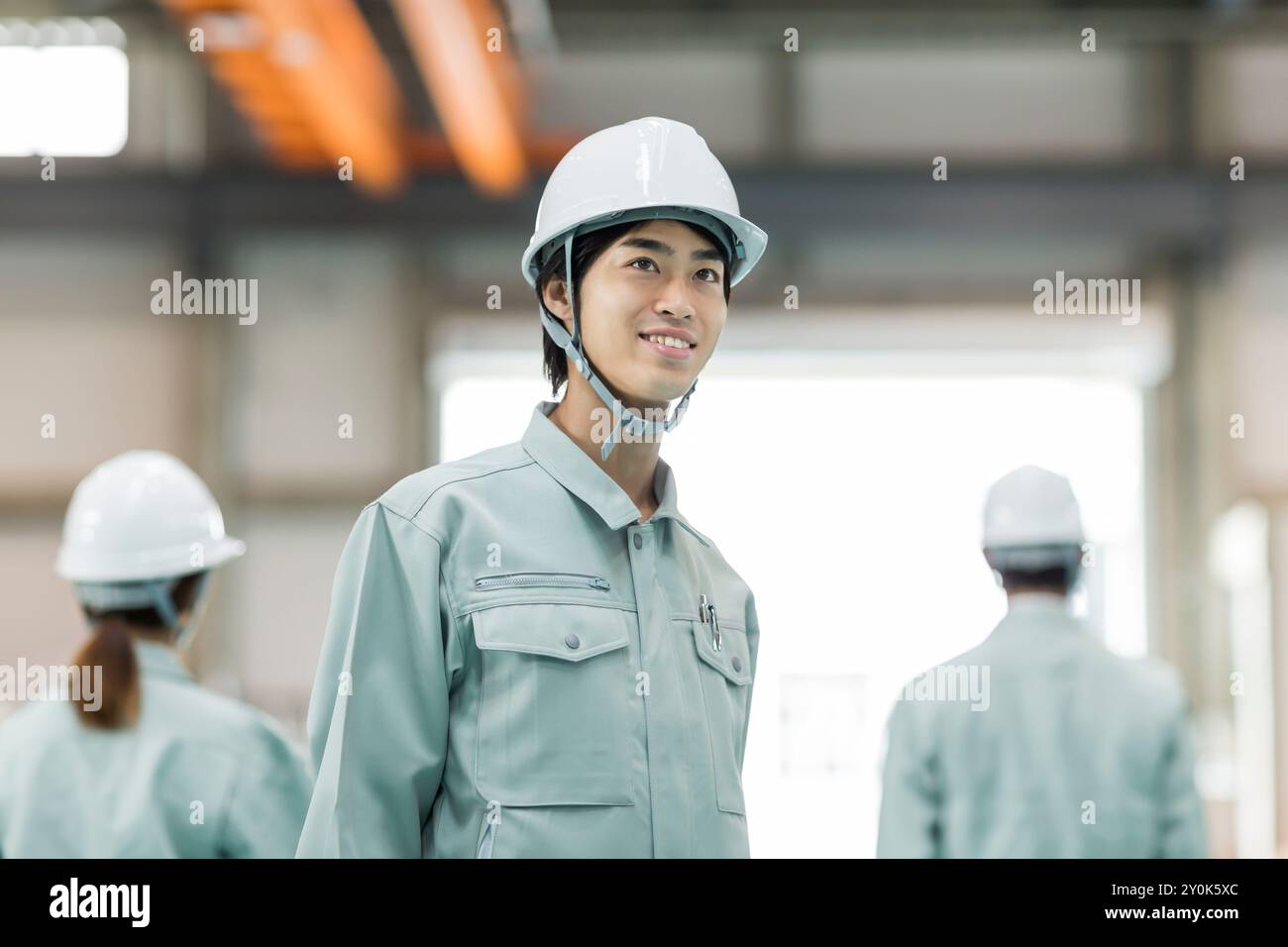 Smiling male worker hi-res stock photography and images - Alamy