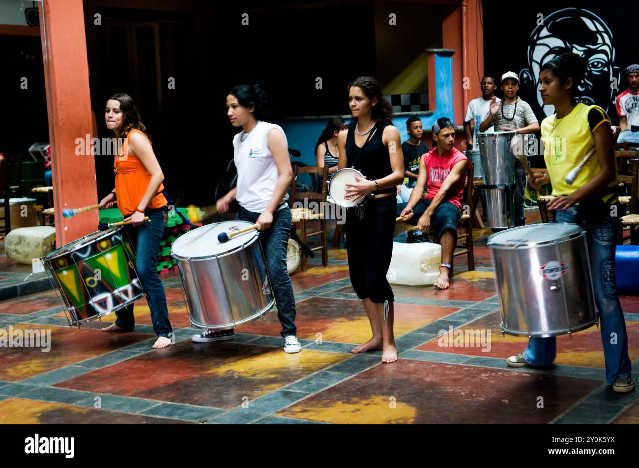local youth play music and dance in the Humming bird center in one of ...