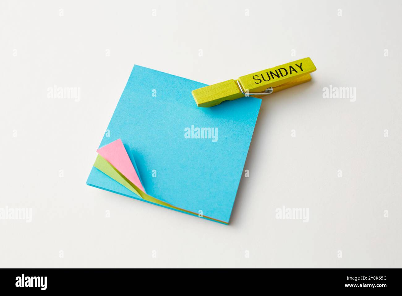 Sunday slip attached with a clip and post-it note Stock Photo - Alamy