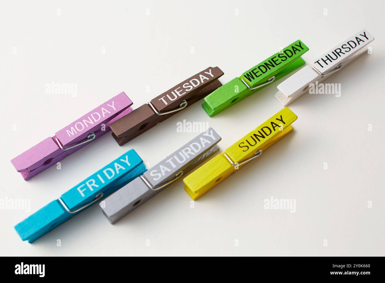 One week's slip attached with a clip Stock Photo - Alamy