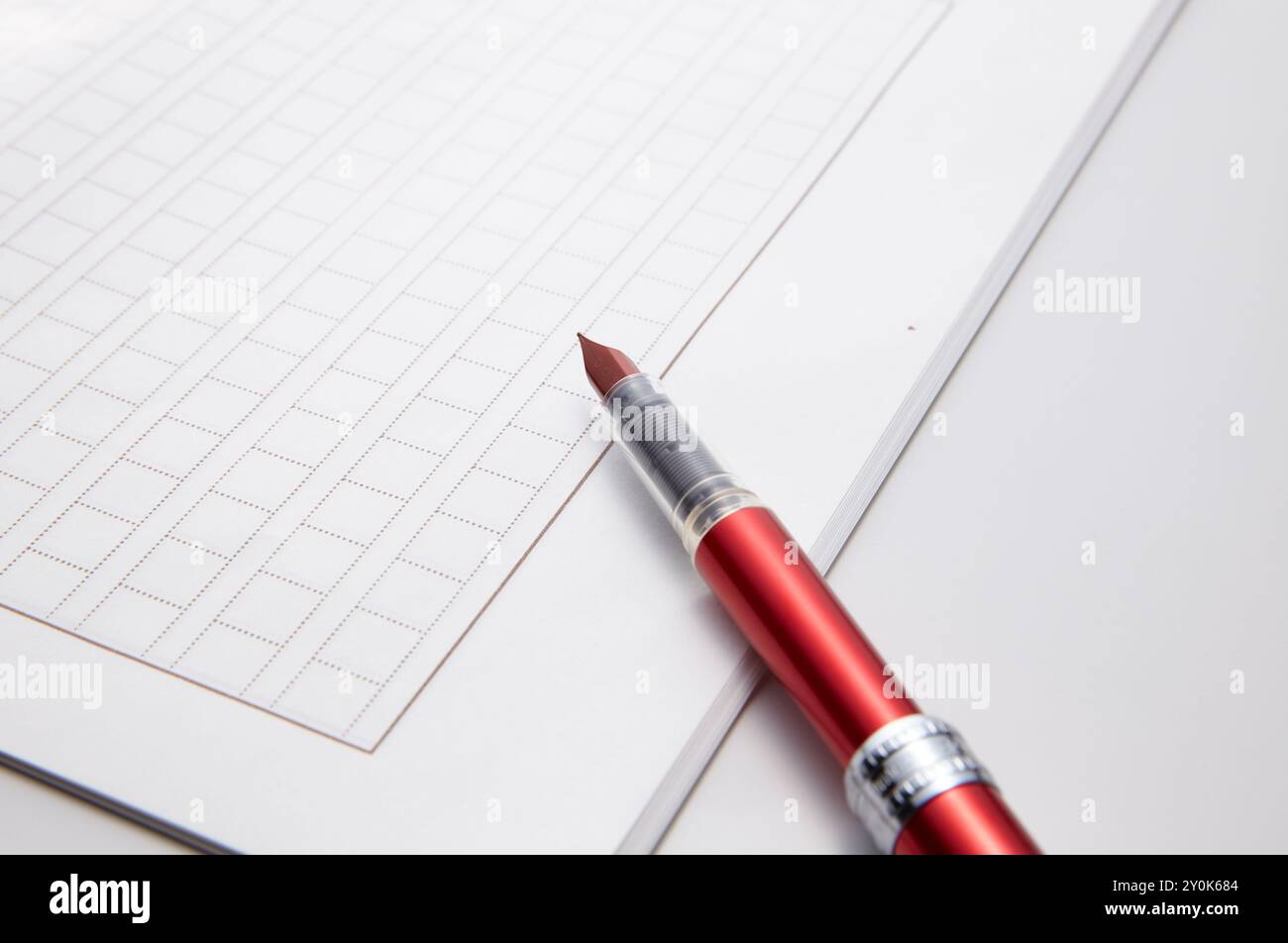 White manuscript paper with pen Stock Photo - Alamy