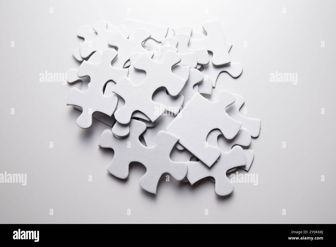 Jigsaw puzzle pieces stacked up Stock Photo - Alamy