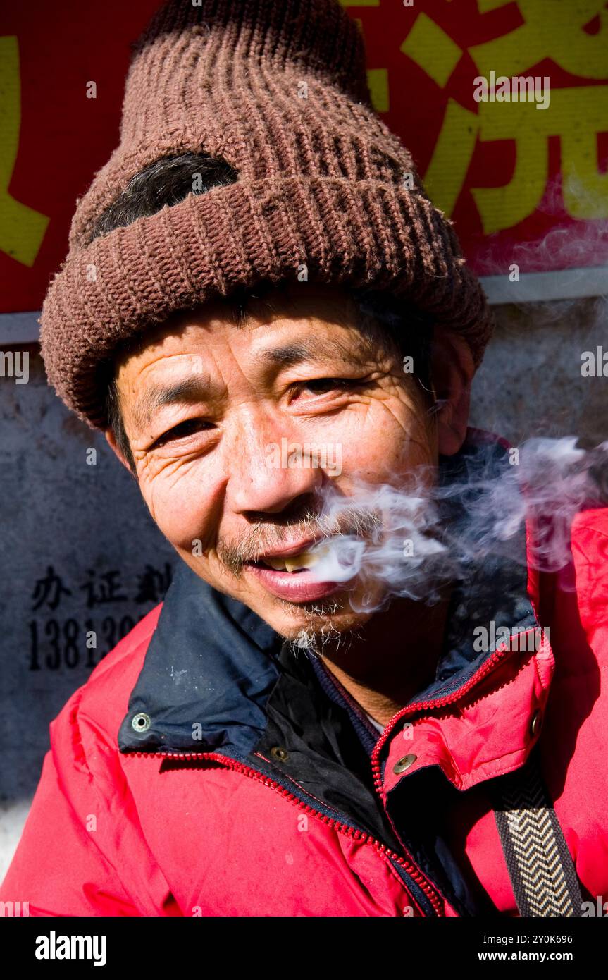 Portrait of a Chinese man smoking. Photo taken in Nanjing, China Stock ...