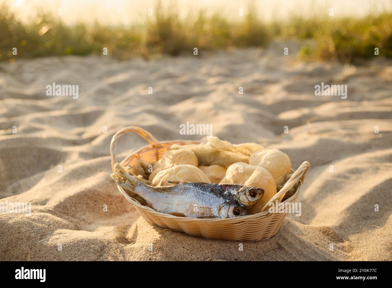 Christianity, religion, Bible concept. Five loaves of bread and two ...
