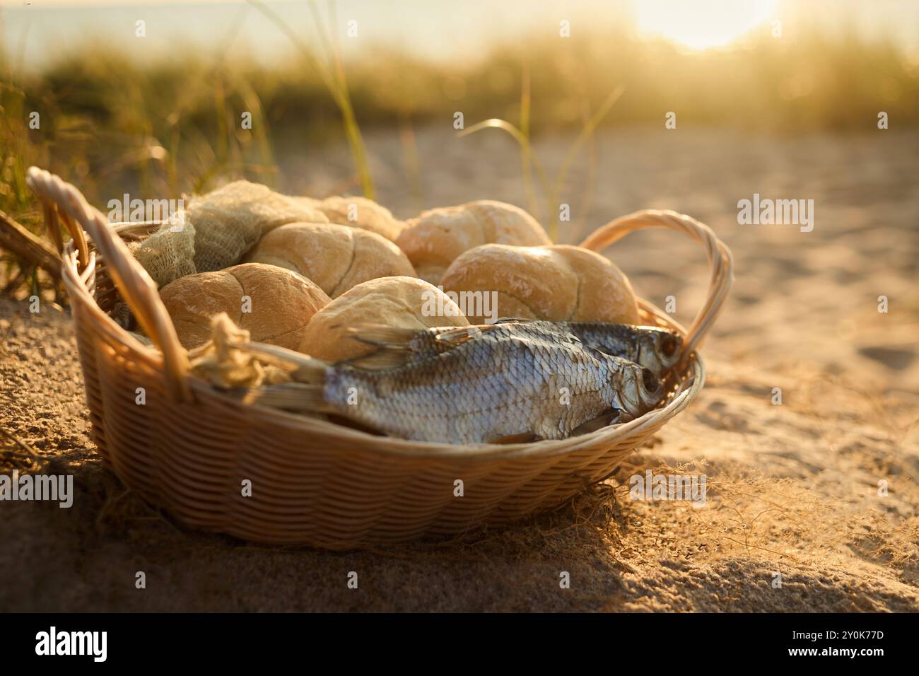Christianity, religion, Bible concept. Five loaves of bread and two ...