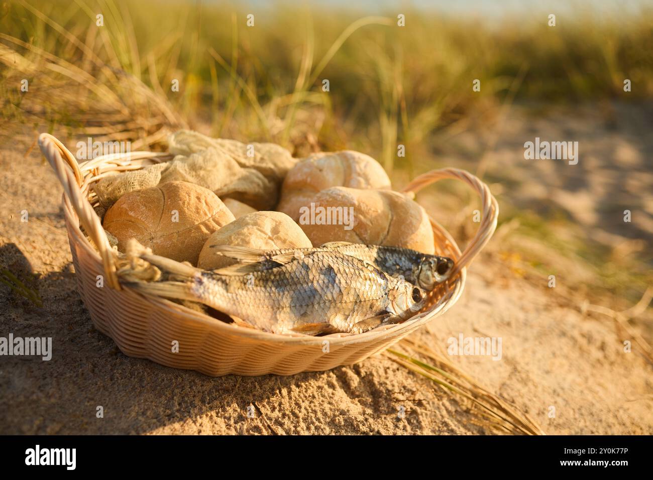 Christianity, religion, Bible concept. Five loaves of bread and two ...