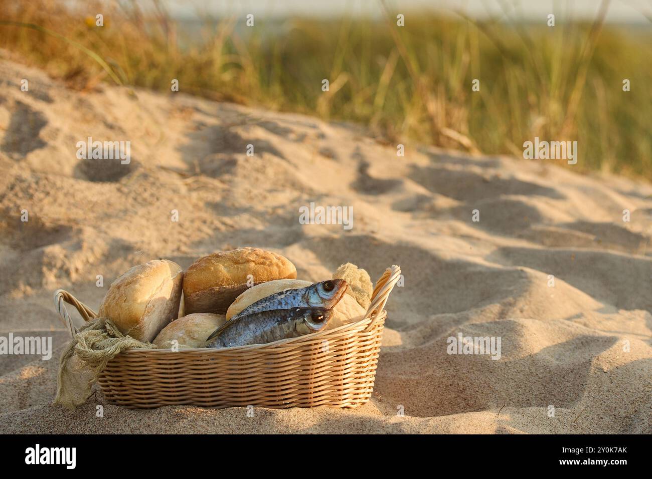 Christianity, religion, Bible concept. Five loaves of bread and two ...
