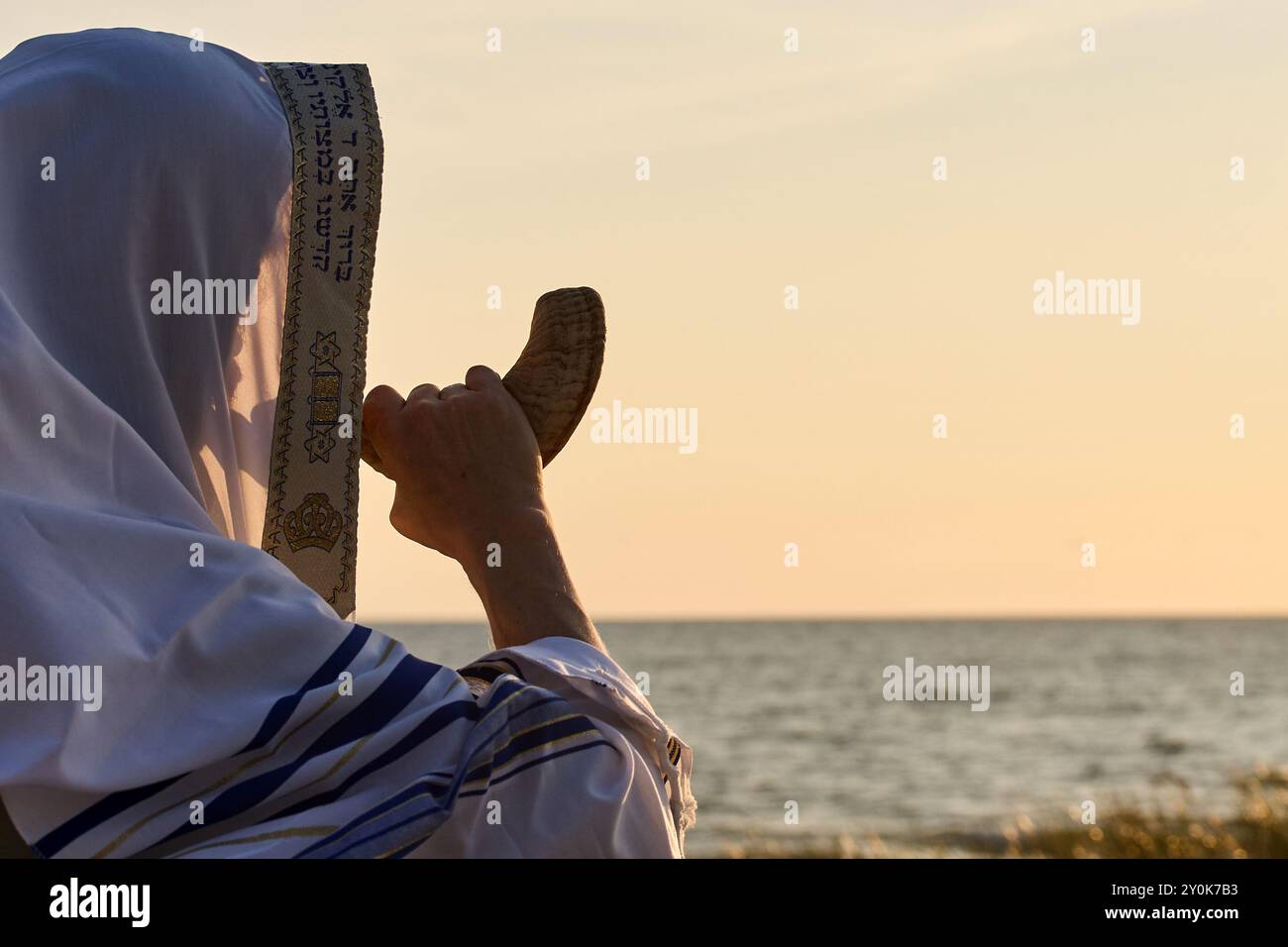 Jewish man blowing the Shofar rams horn on Rosh Hashanah and Yom Kippur ...