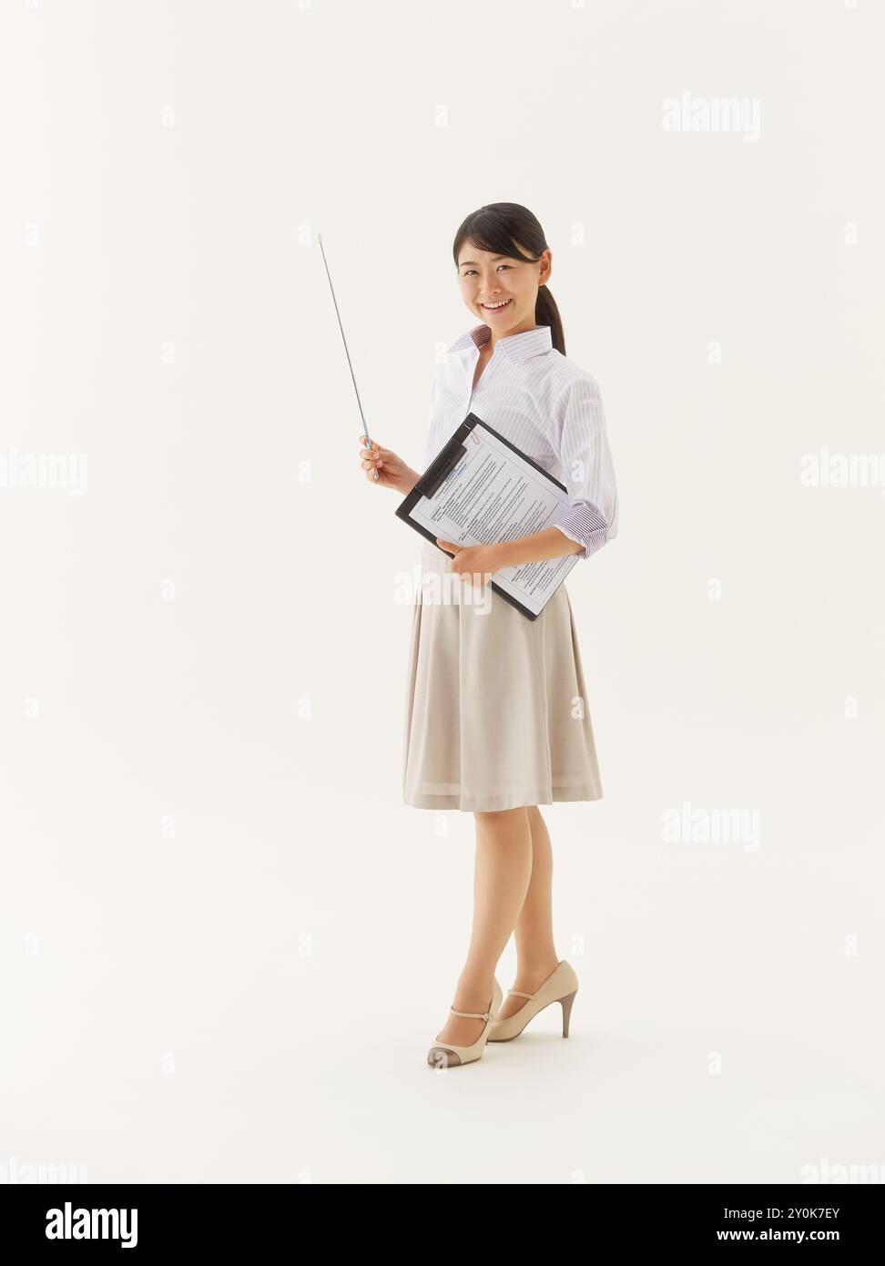 Teacher with a pointer Stock Photo - Alamy