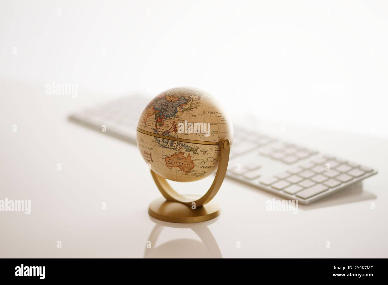 Keyboard and a globe Stock Photo - Alamy