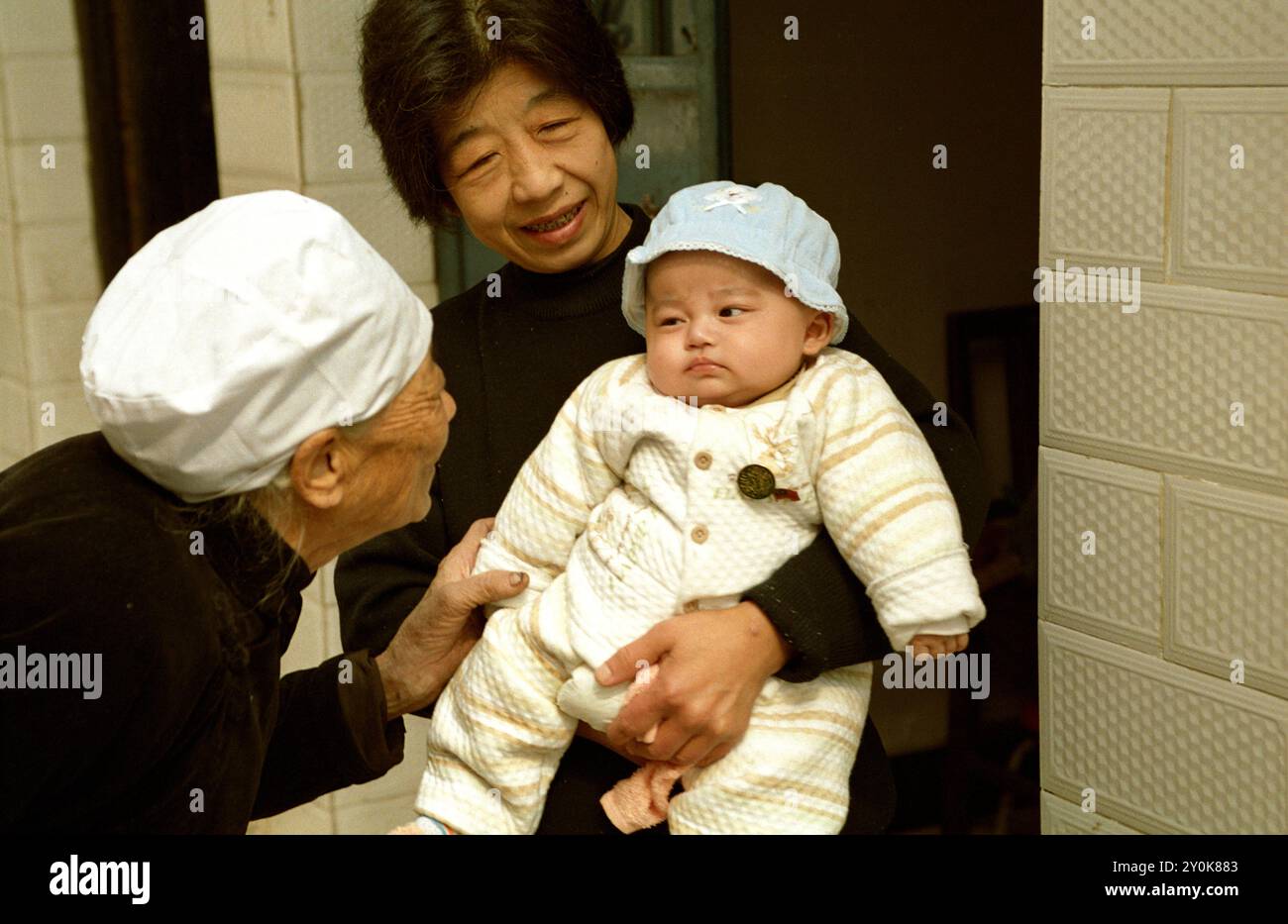 Three generations together in Xian, China Stock Photo - Alamy