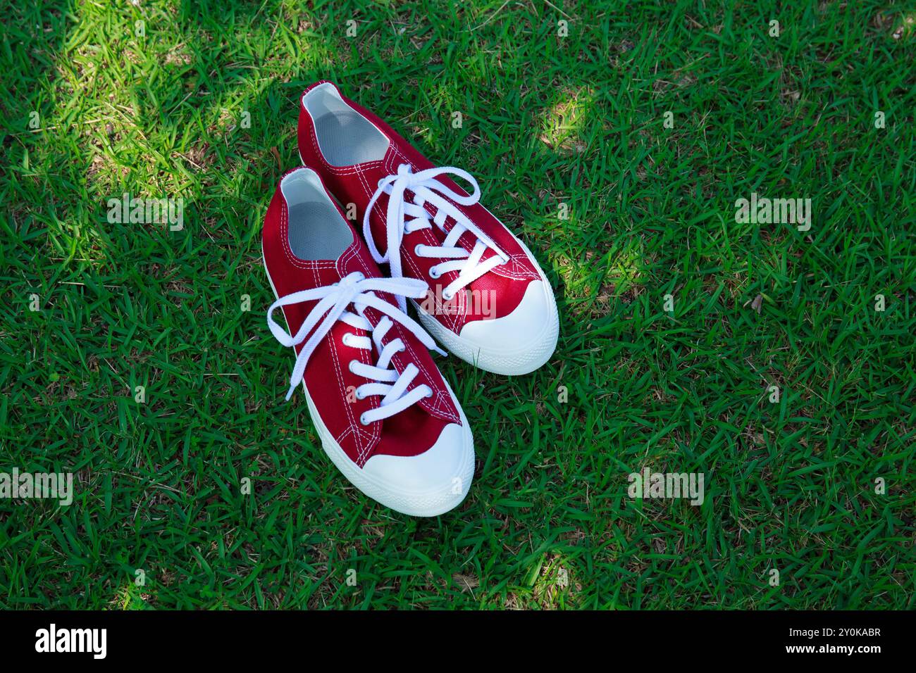 Red sneakers hi-res stock photography and images - Alamy