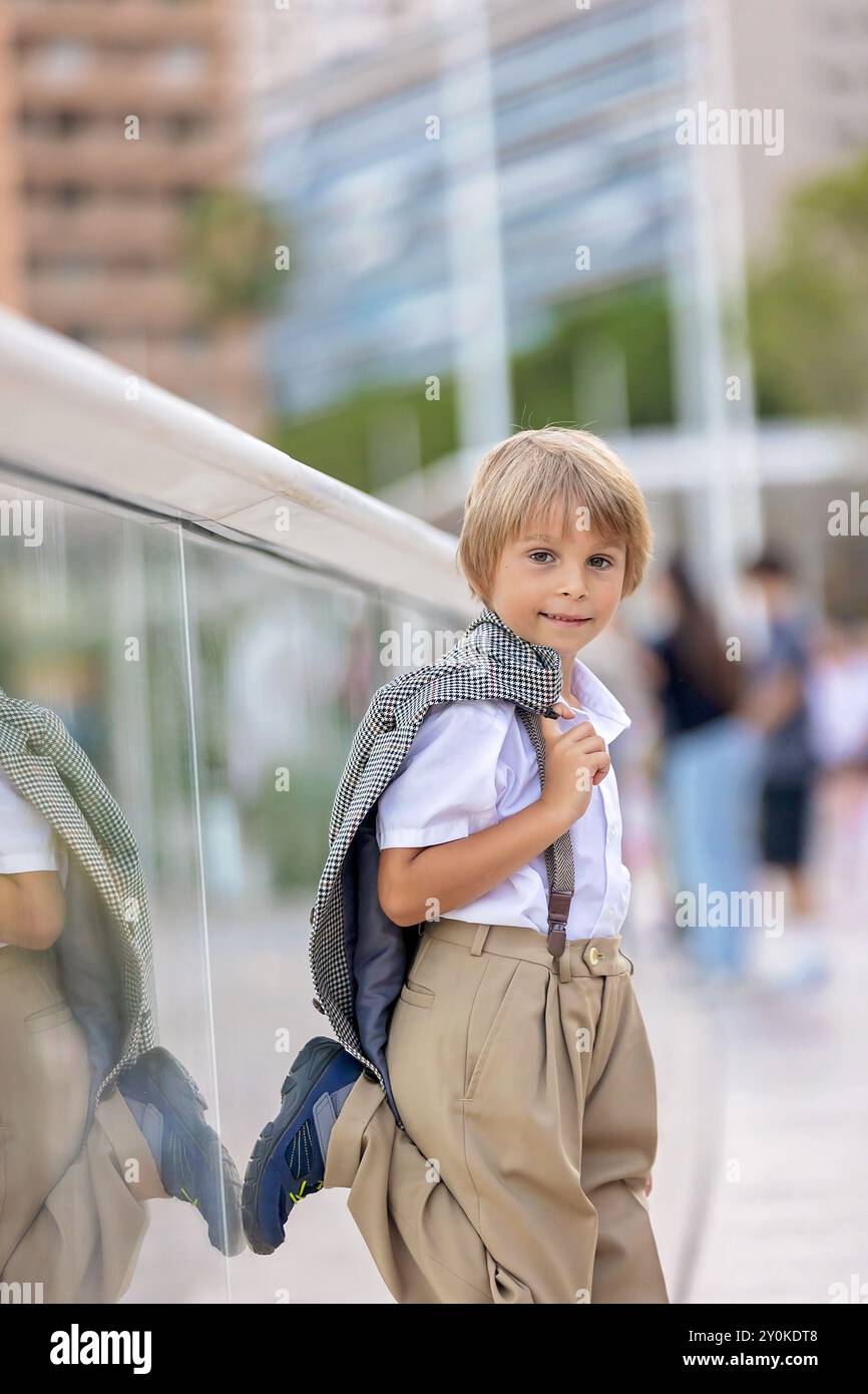 Beautiful fashion little boy, child in suit and tie, visiting Monaco ...