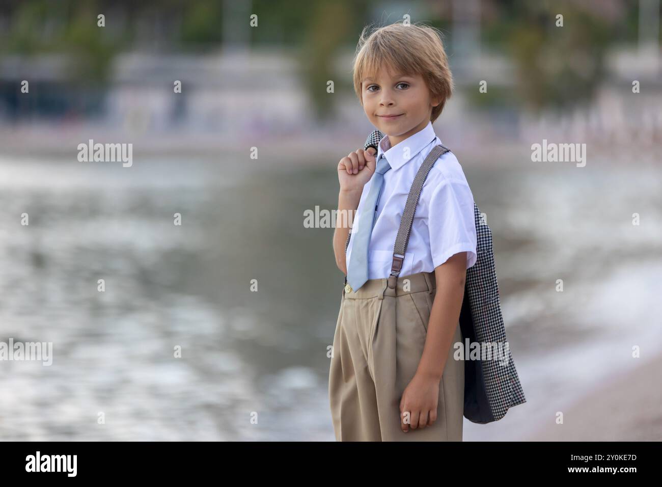 Beautiful fashion little boy, child in suit and tie, visiting Monaco ...