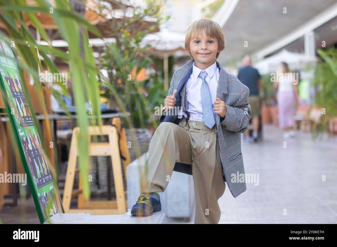 Beautiful fashion little boy, child in suit and tie, visiting Monaco ...