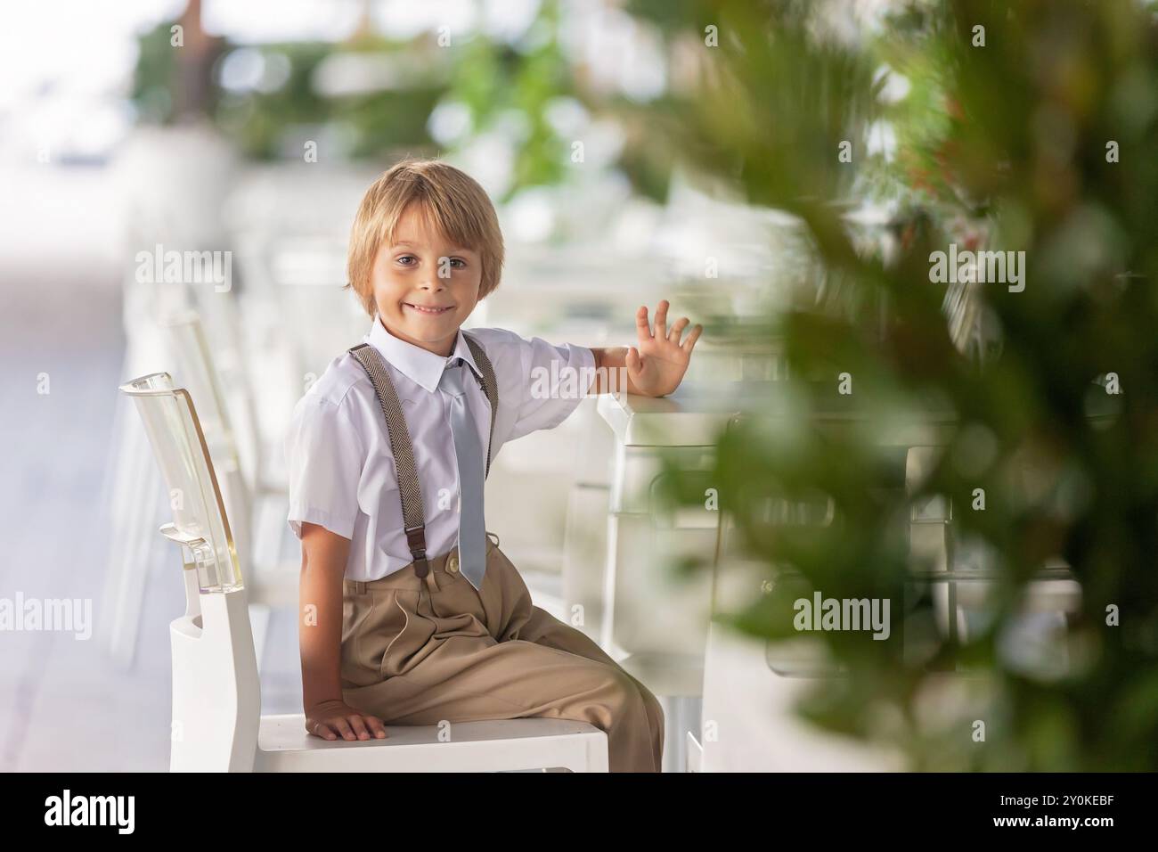 Beautiful fashion little boy, child in suit and tie, visiting Monaco ...
