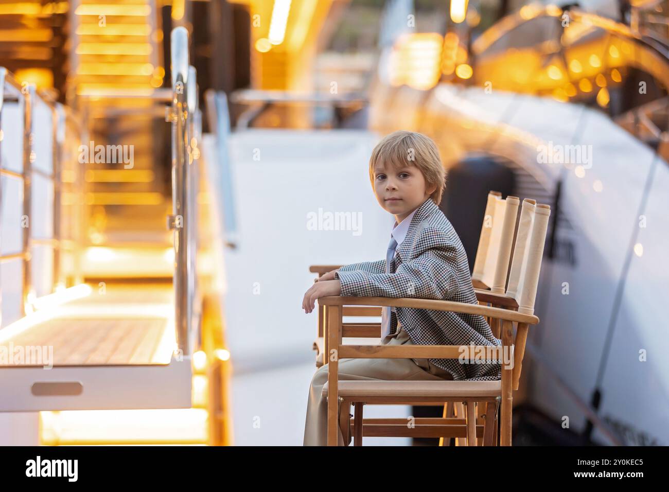 Beautiful fashion little boy, child in suit and tie, visiting Monaco ...