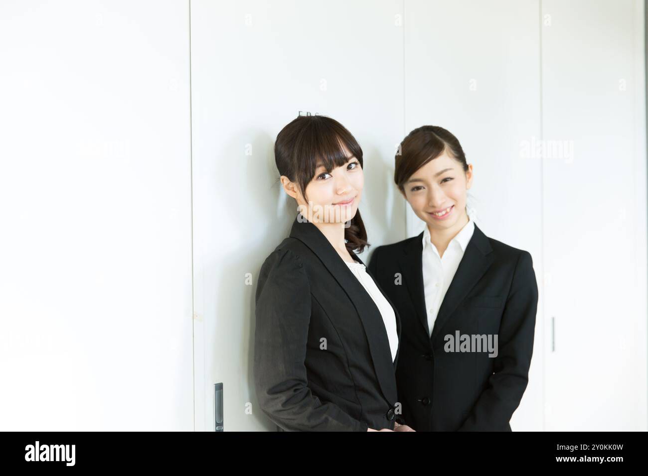 Two businesswomen with smile Stock Photo - Alamy