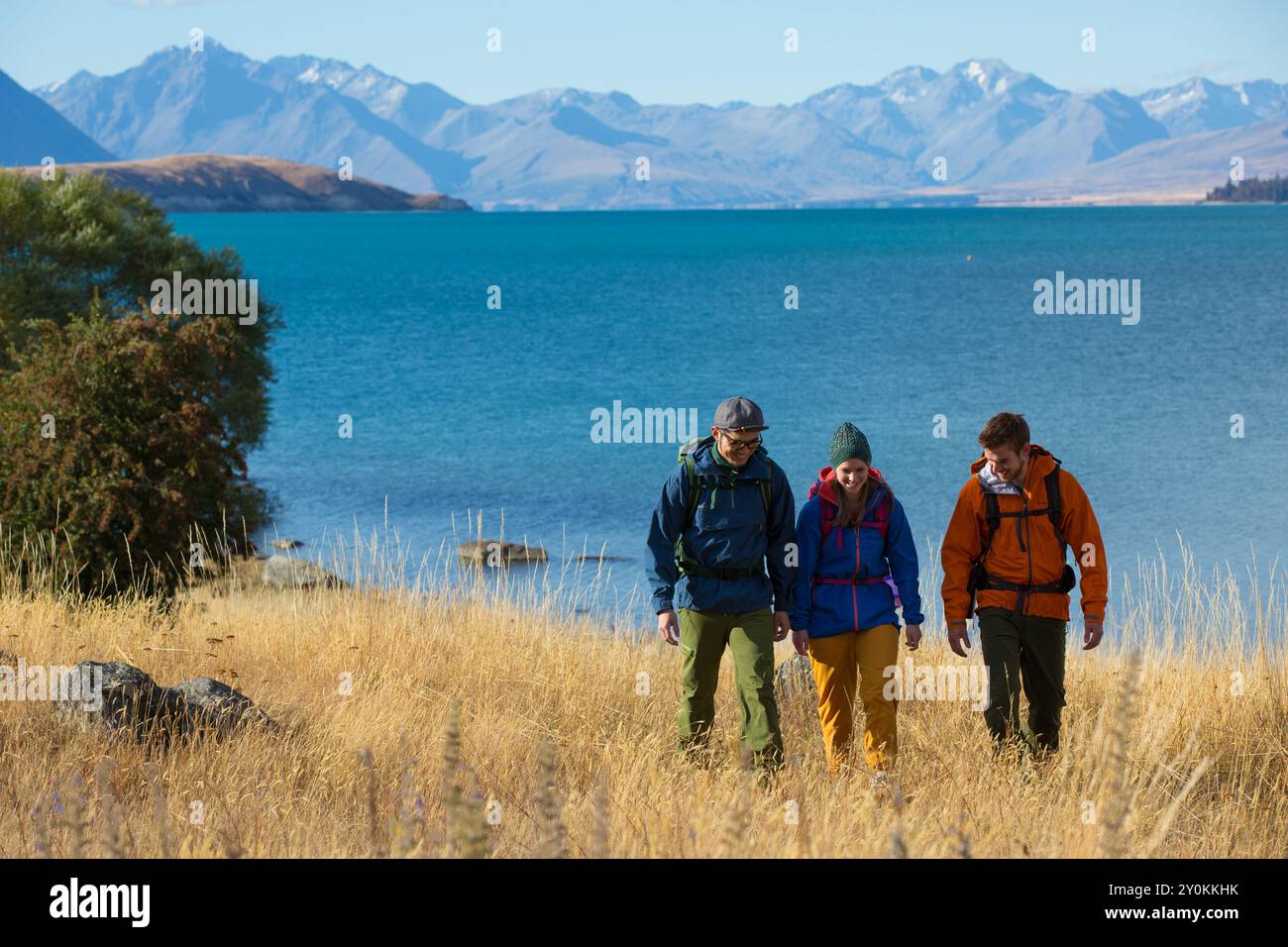 Japanese man in his thirties trekking with foreign couple Stock Photo ...
