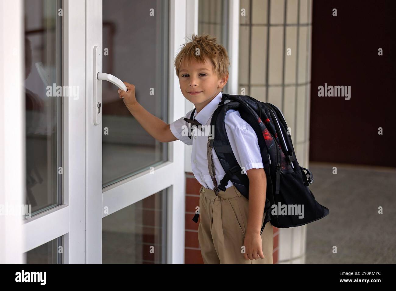 Cute first grade school child, going to school. First day at school for ...