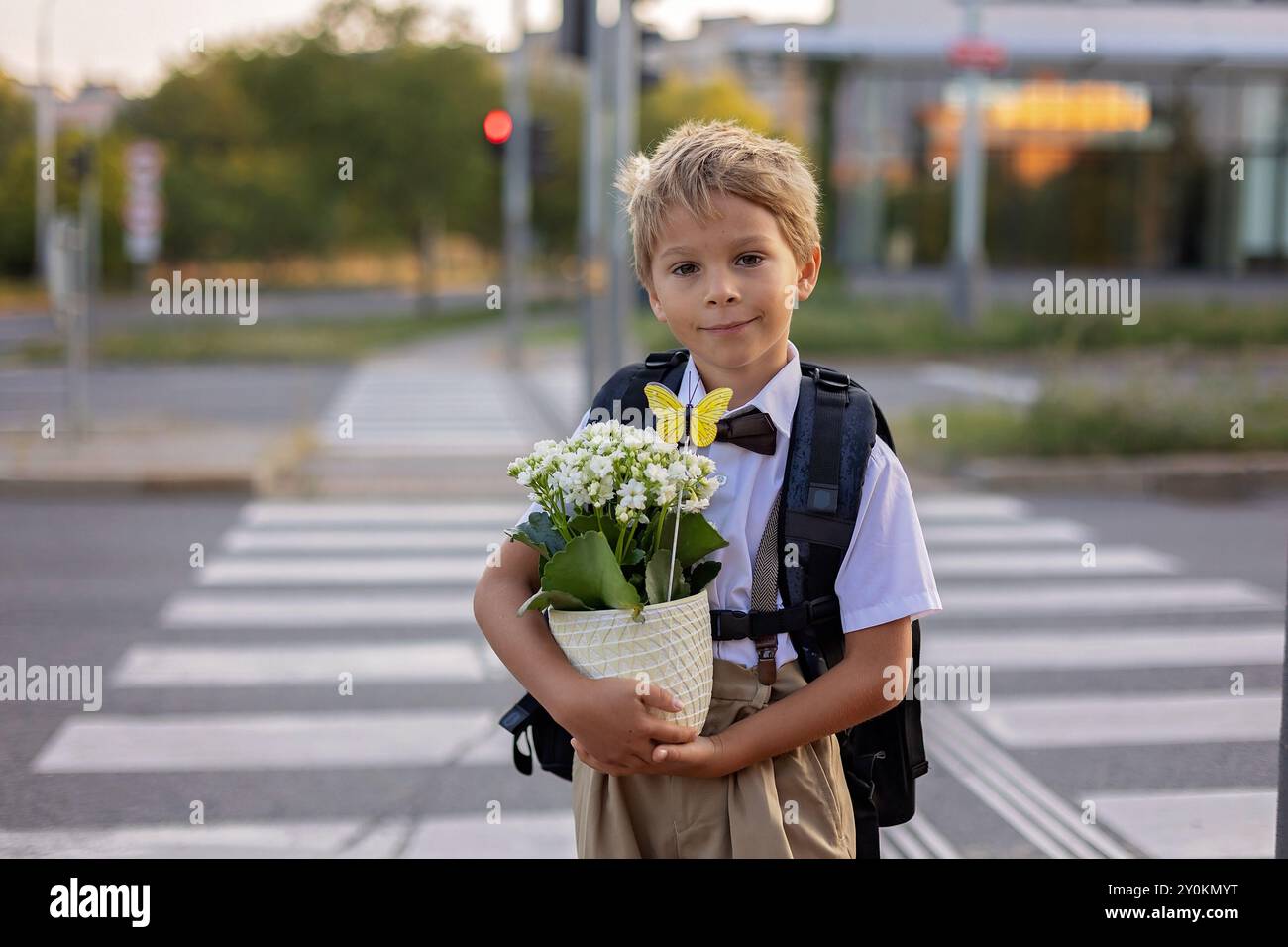 Cute first grade school child, going to school. First day at school for ...