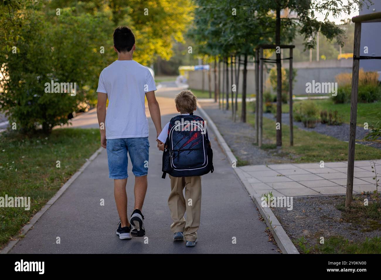 Cute first grade school child, going to school. First day at school for ...