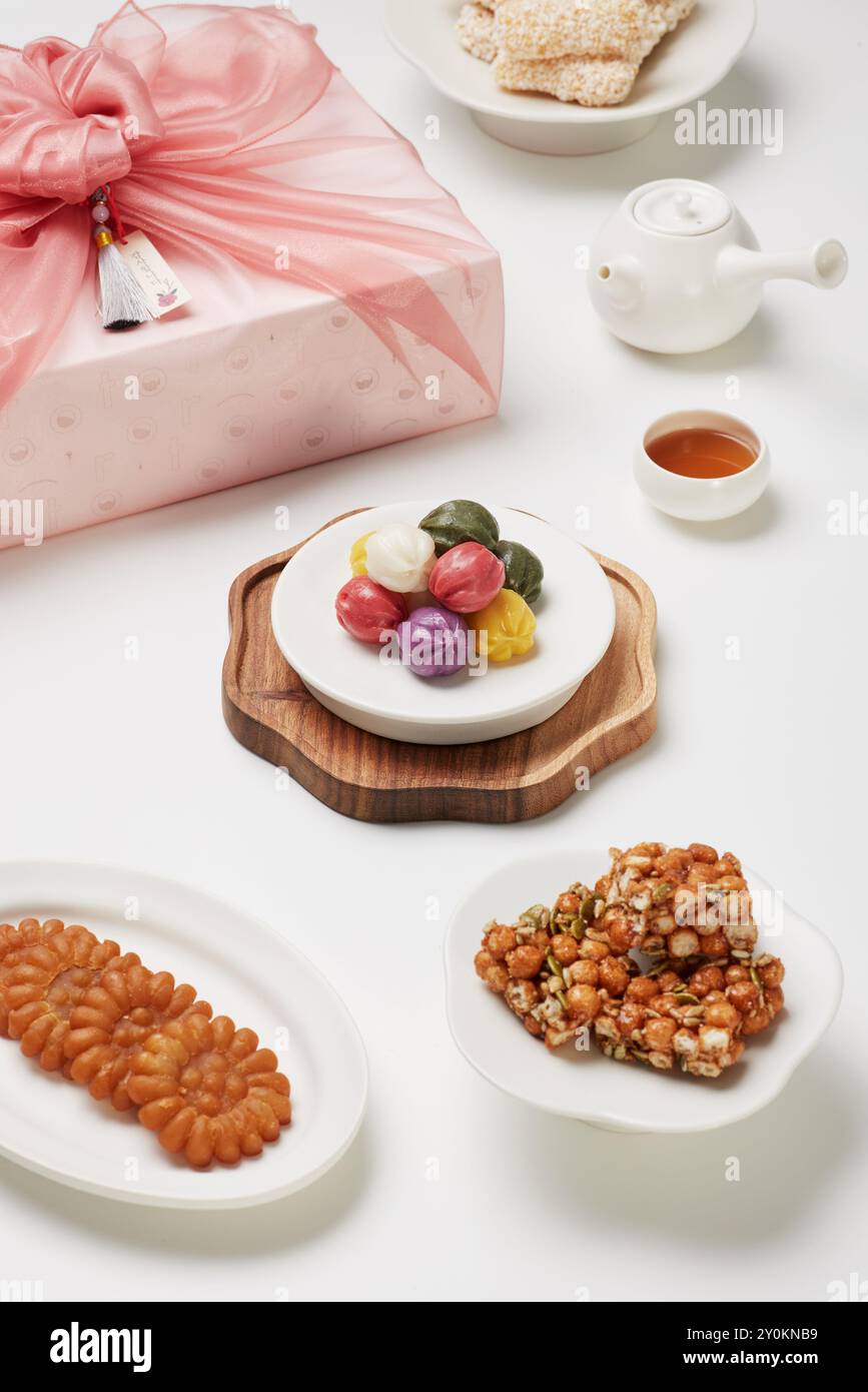Composition of various Korean desserts and gift wrappers Stock Photo ...