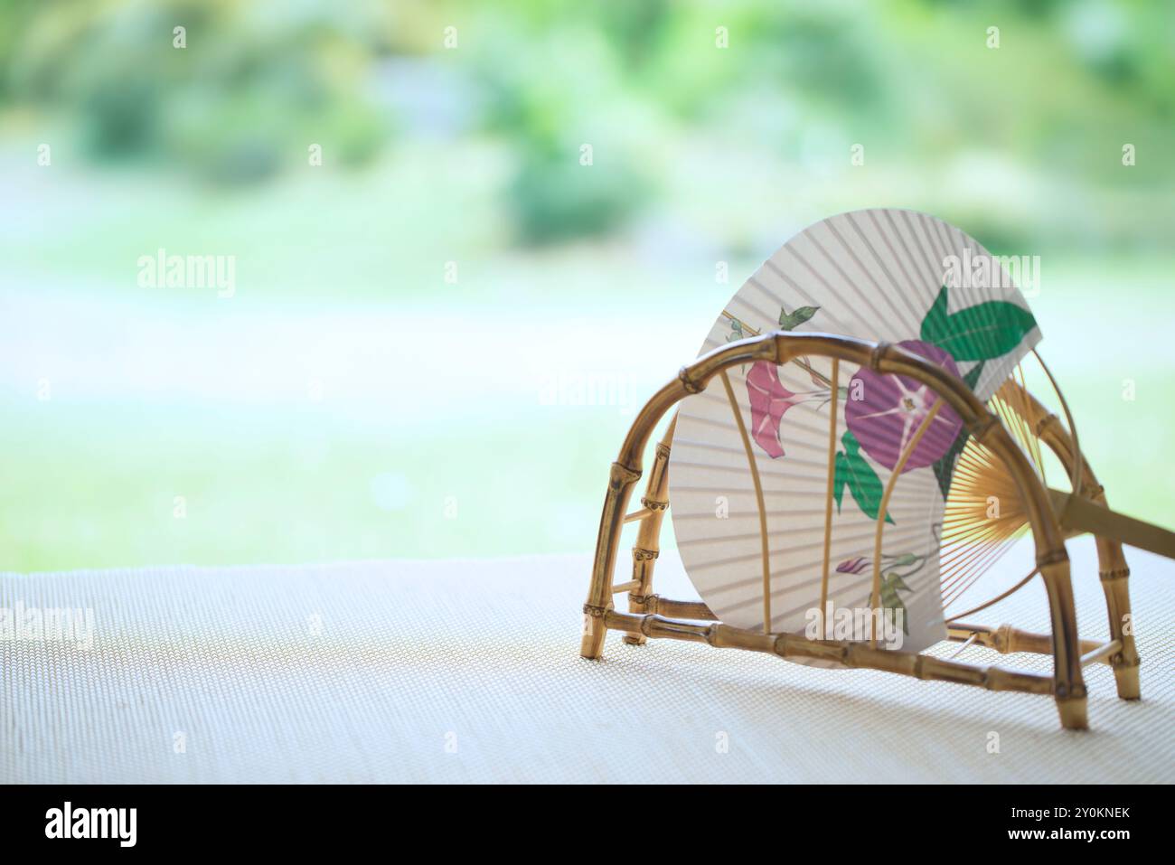 Round fan and round fan folder Stock Photo - Alamy