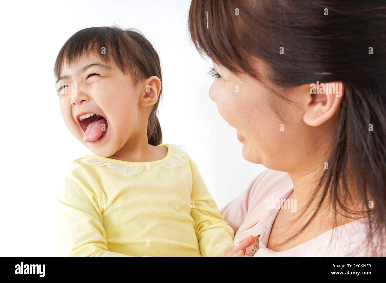 Mother carrying her child Stock Photo - Alamy Mother carrying her child Stock Photo - Alamy