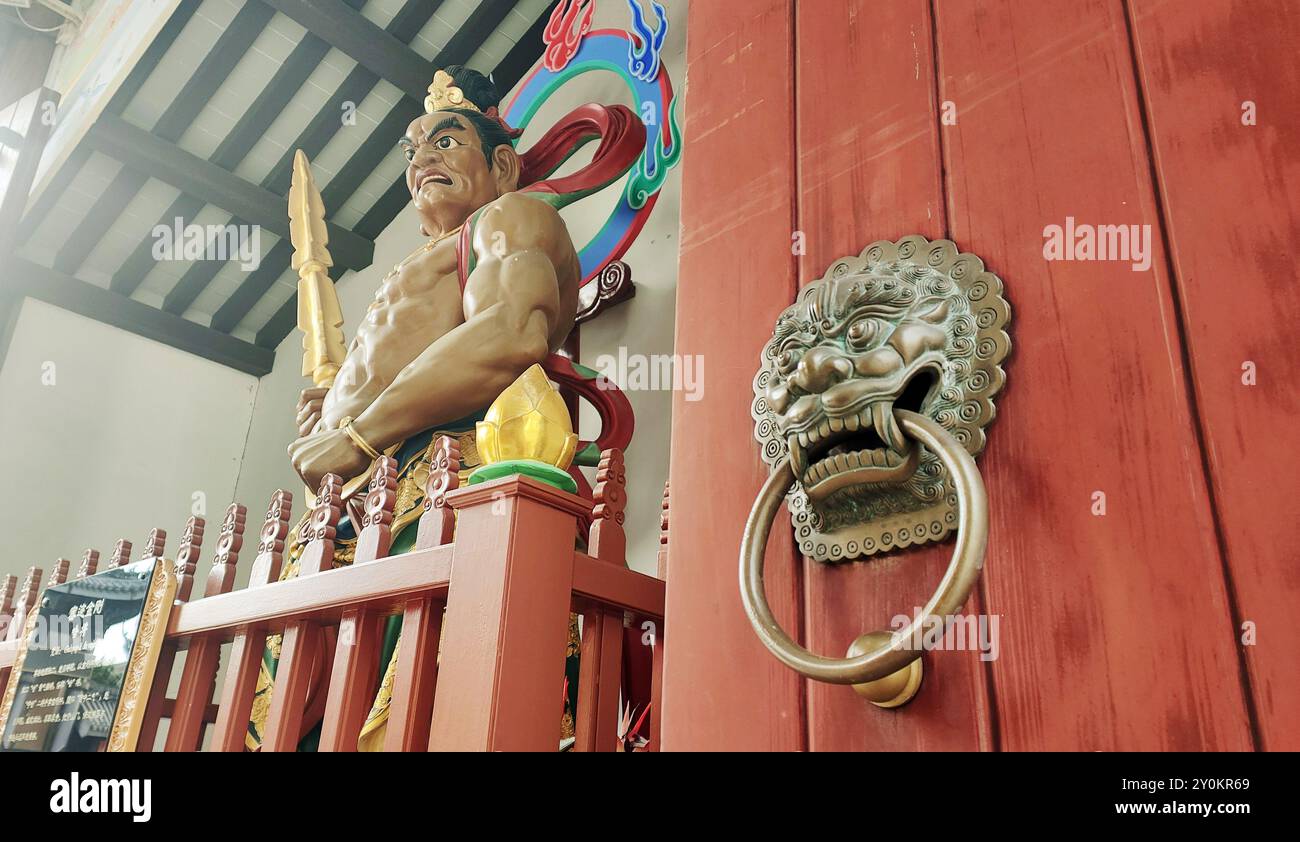 SHANGHAI, CHINA - SEPTEMBER 1, 2024 - The temple gate and gatekeeper ...