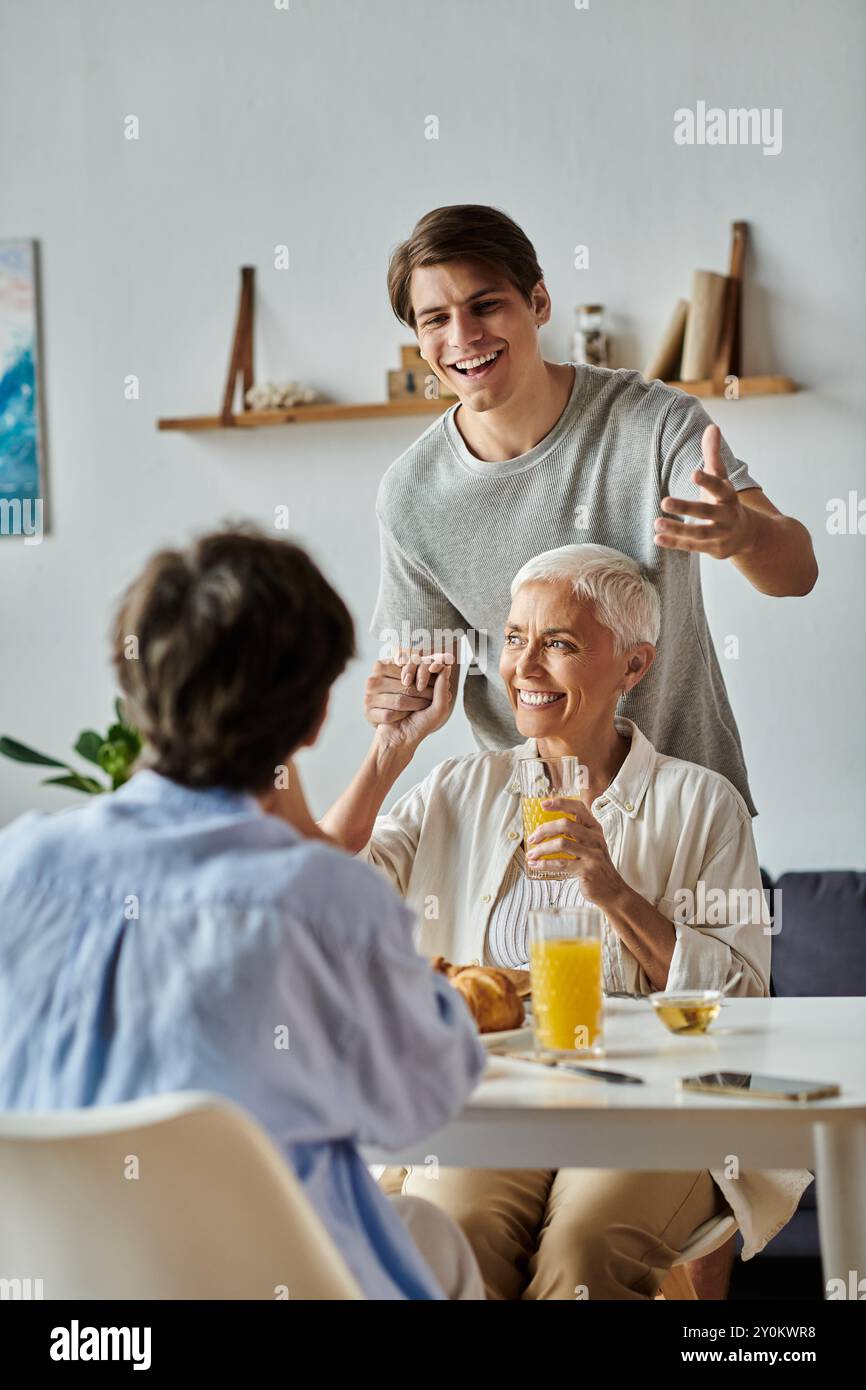A loving LGBTQ family shares a joyful breakfast, filled with laughter ...