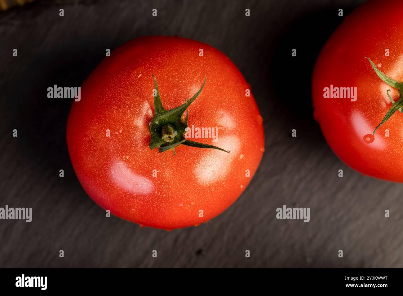 group of ripe red tomatoes on the table, fresh soft tomatoes for salads ...