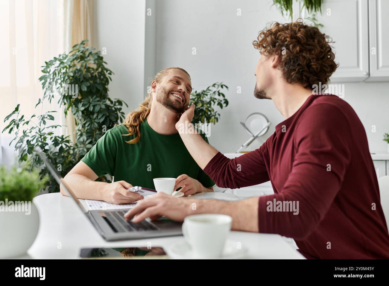 Gay couple share tender hi-res stock photography and images - Alamy