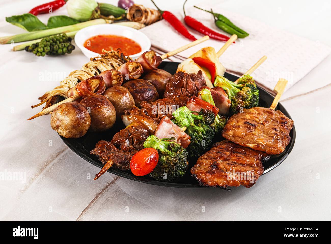 Asian grilled skewer assortment satay with beef, porl, chicken and ...