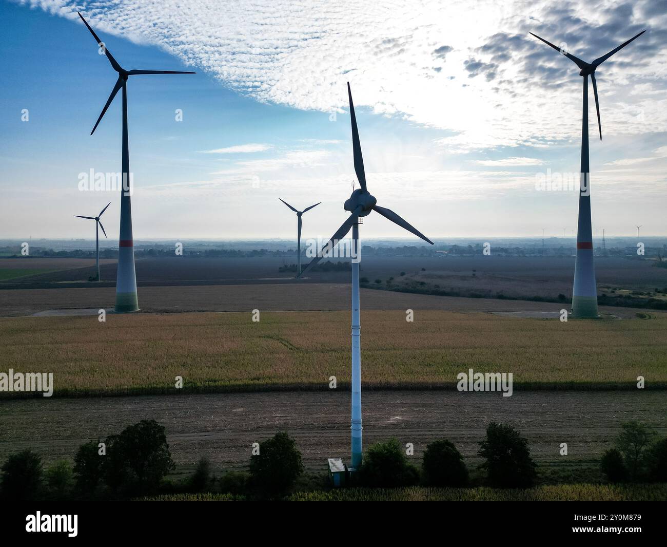 03 September 2024, Saxony-Anhalt, Großkorbetha: Wind turbines in a ...