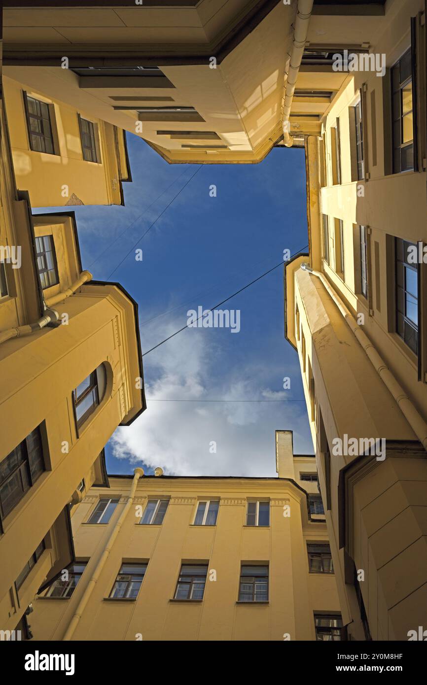 Small courtyard (courtyard well) with blue sky in historical center of ...