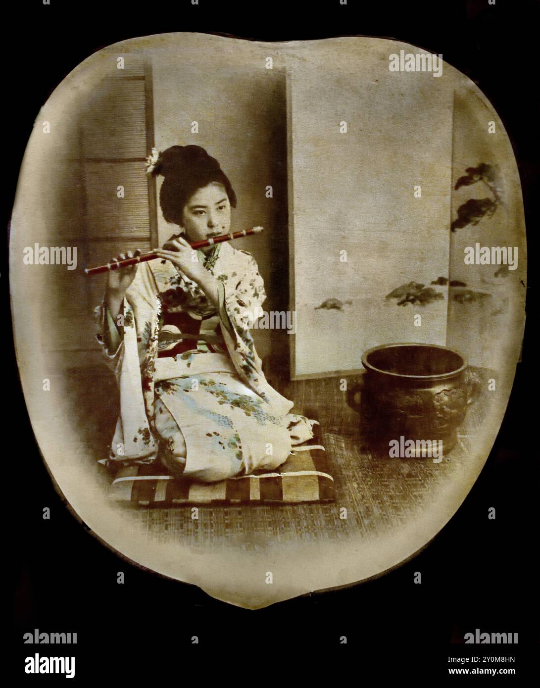 Uchiwa Fan - A woman playing a Kagurabue flute, 1900-1910 unknown photo ...