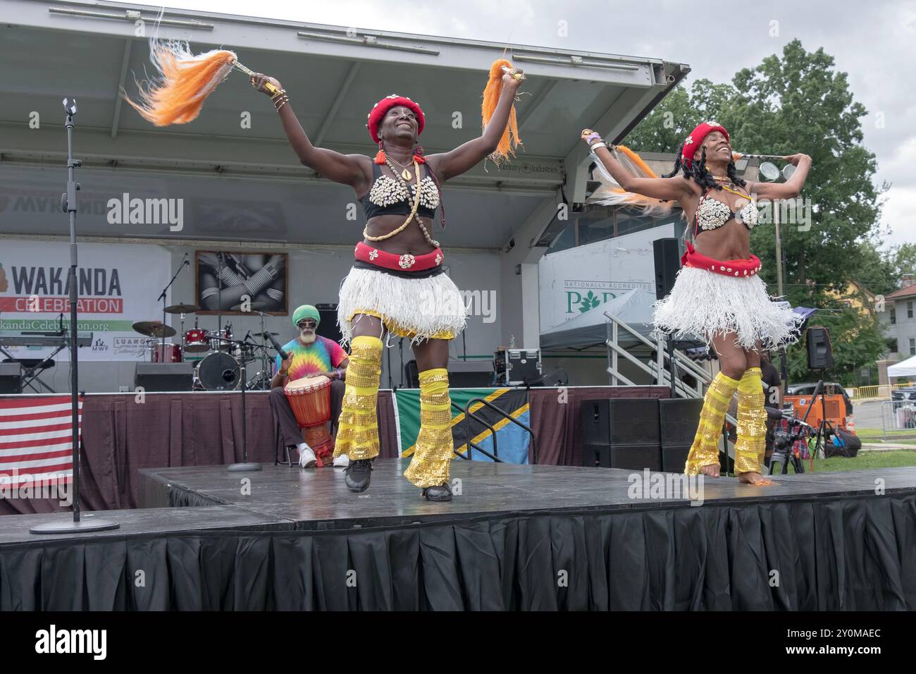 2 dancers from the Fusha Dance Company dance wering Congolese costumes ...