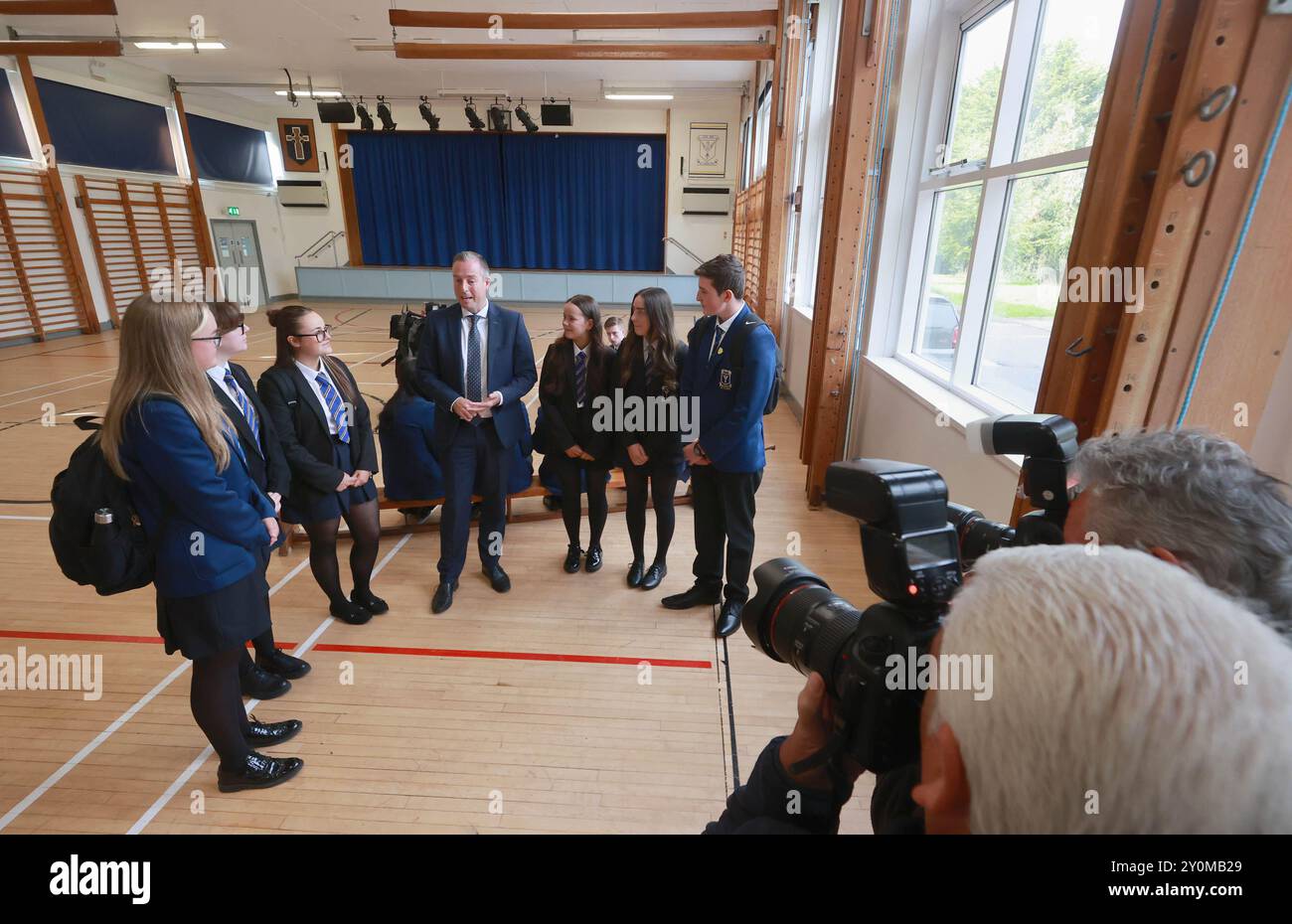 Education Minister Paul Givan speaking to students during a visit to St Columbanus' College ...
