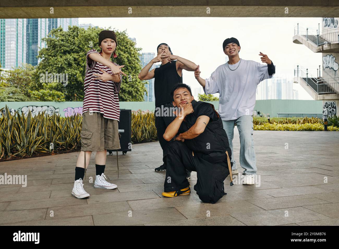 Group of Young Friends Posing Outdoors Under Pavilion Stock Photo - Alamy
