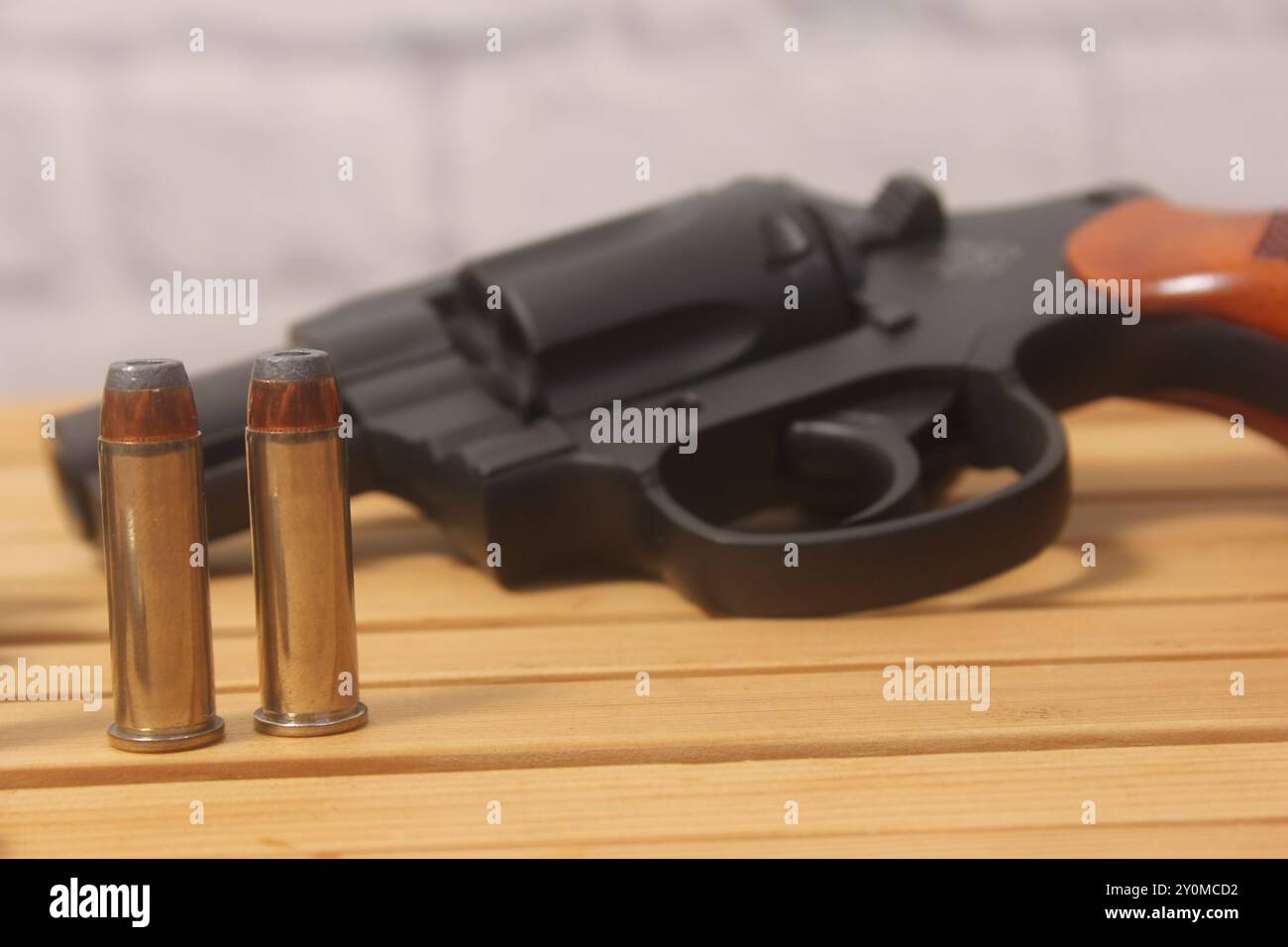 Vintage Revolver Gun With Ammo and Speed Loader Stock Photo - Alamy