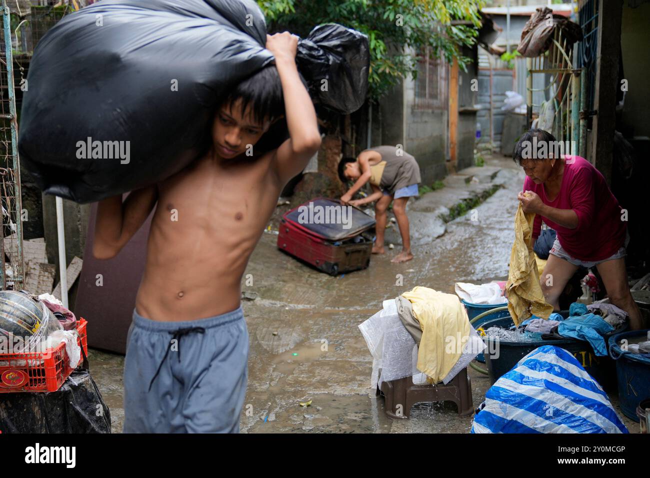 Residents start cleaning as floods caused by Tropical Storm Yagi ...