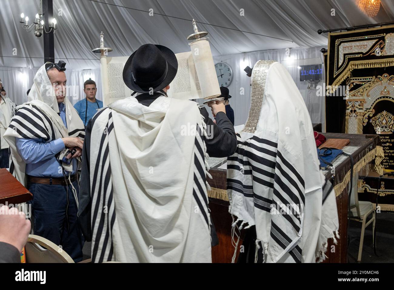 After a Torah read the scroll is lifted up, shown to the congregation ...