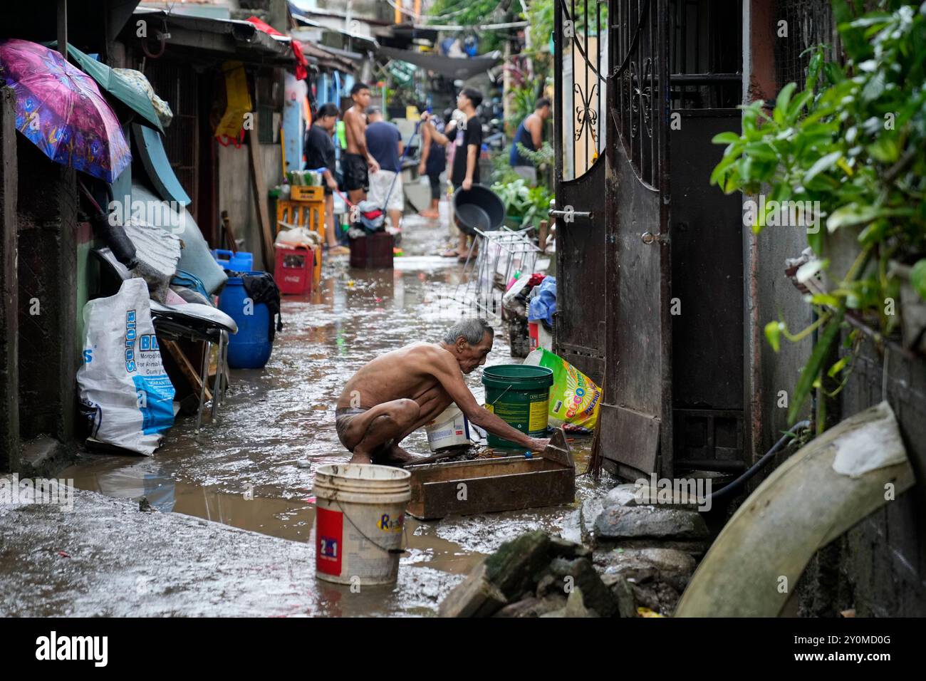 Residents engage in cleaning as floods caused by Tropical Storm Yagi ...